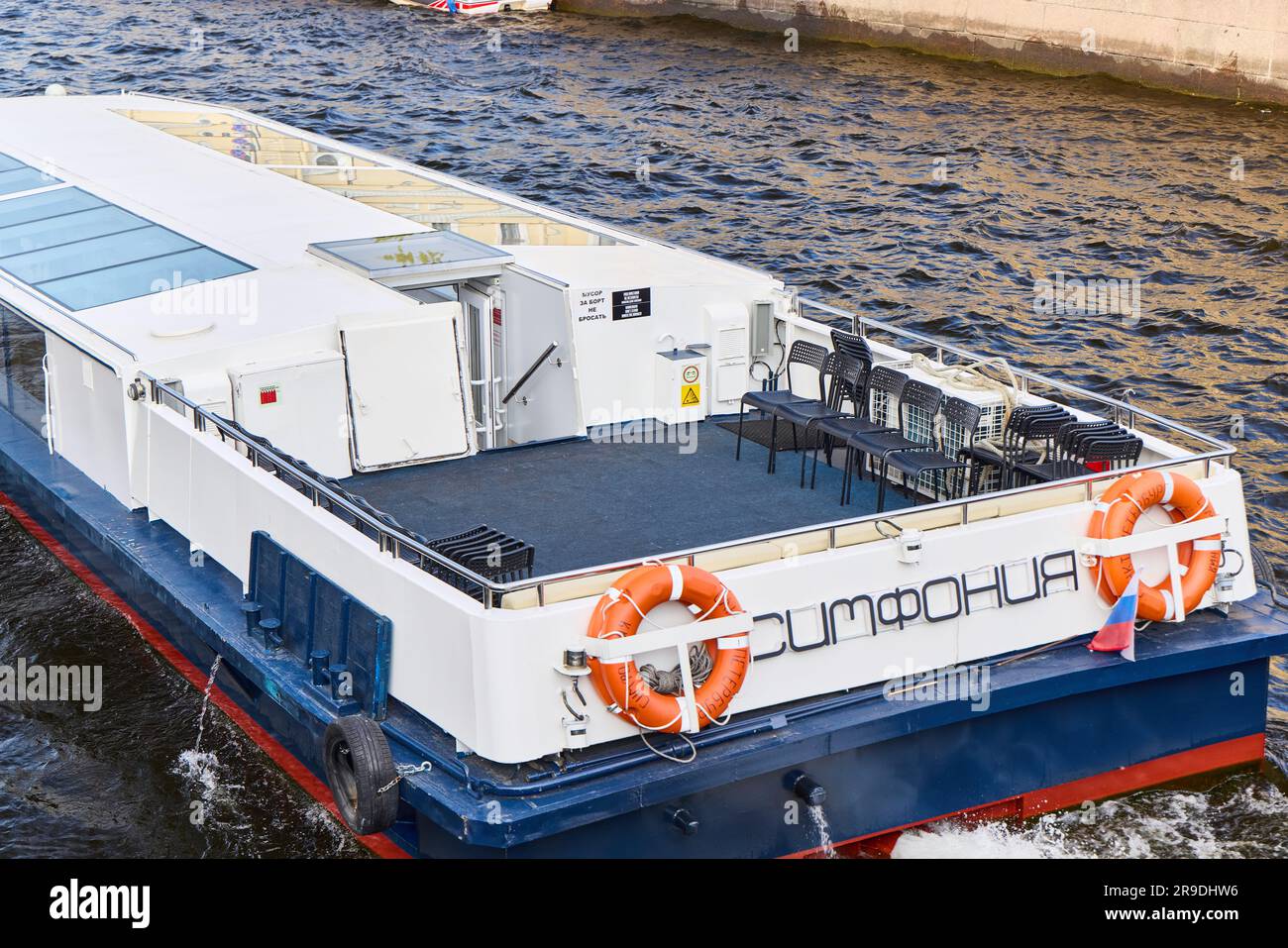 Tourist boat in the river in the city Stock Photo - Alamy