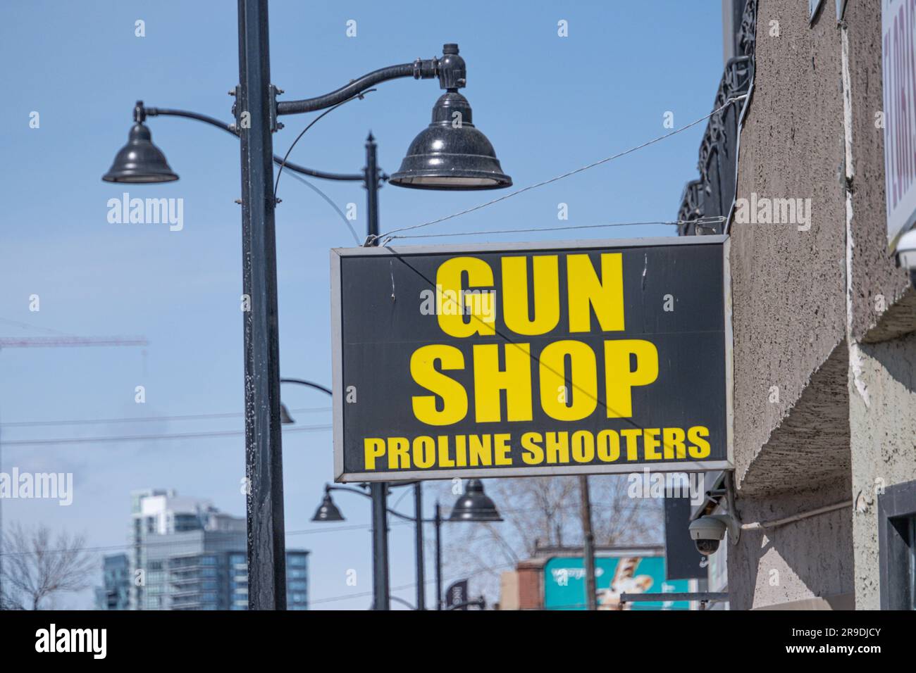 April 16 2023 - Calgary Alberta Canada - Gunshop sign in downtown ...