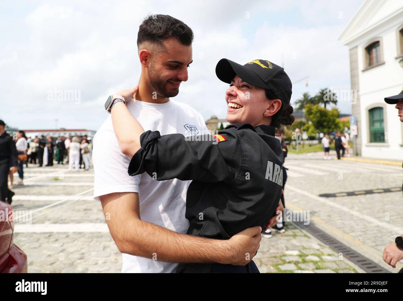 A military woman greets a family member during the reception of the ...