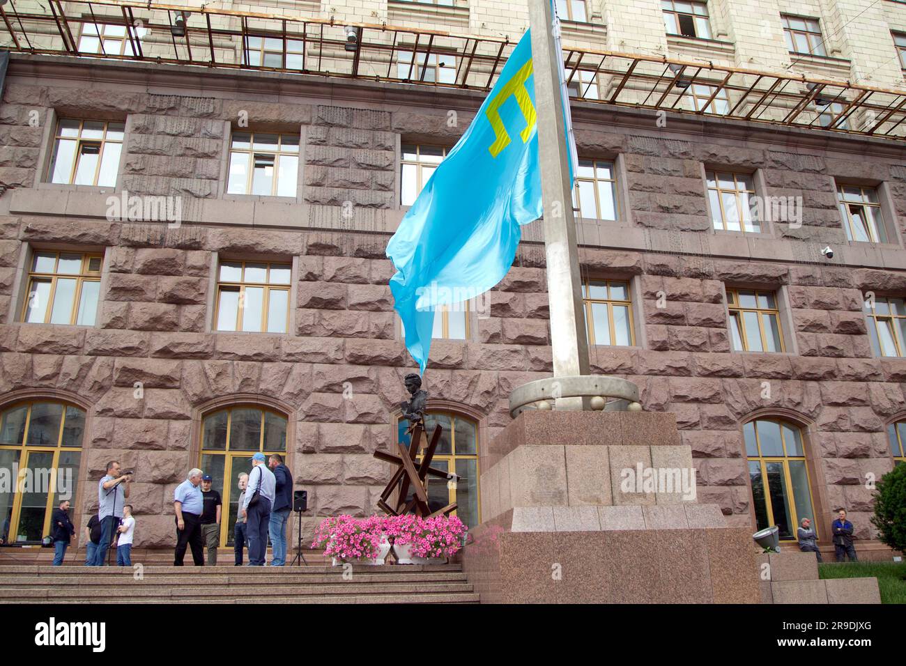 KYIV, UKRAINE - JUNE 26, 2023 - The Crimean Tatar flag is being hoisted ...