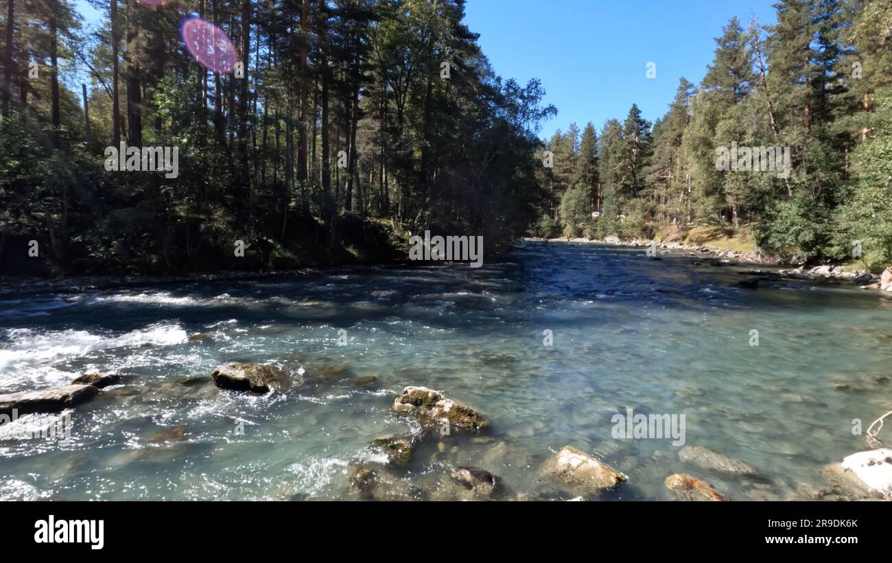 cute fast mountain ridge river with clear water at summer day - photo ...