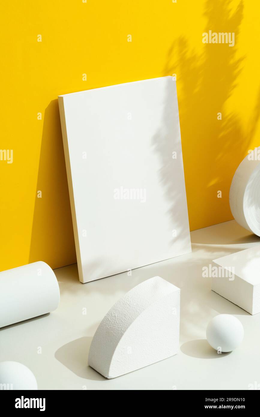 Magazine cover mockup on yellow background with geometric shapes and ...