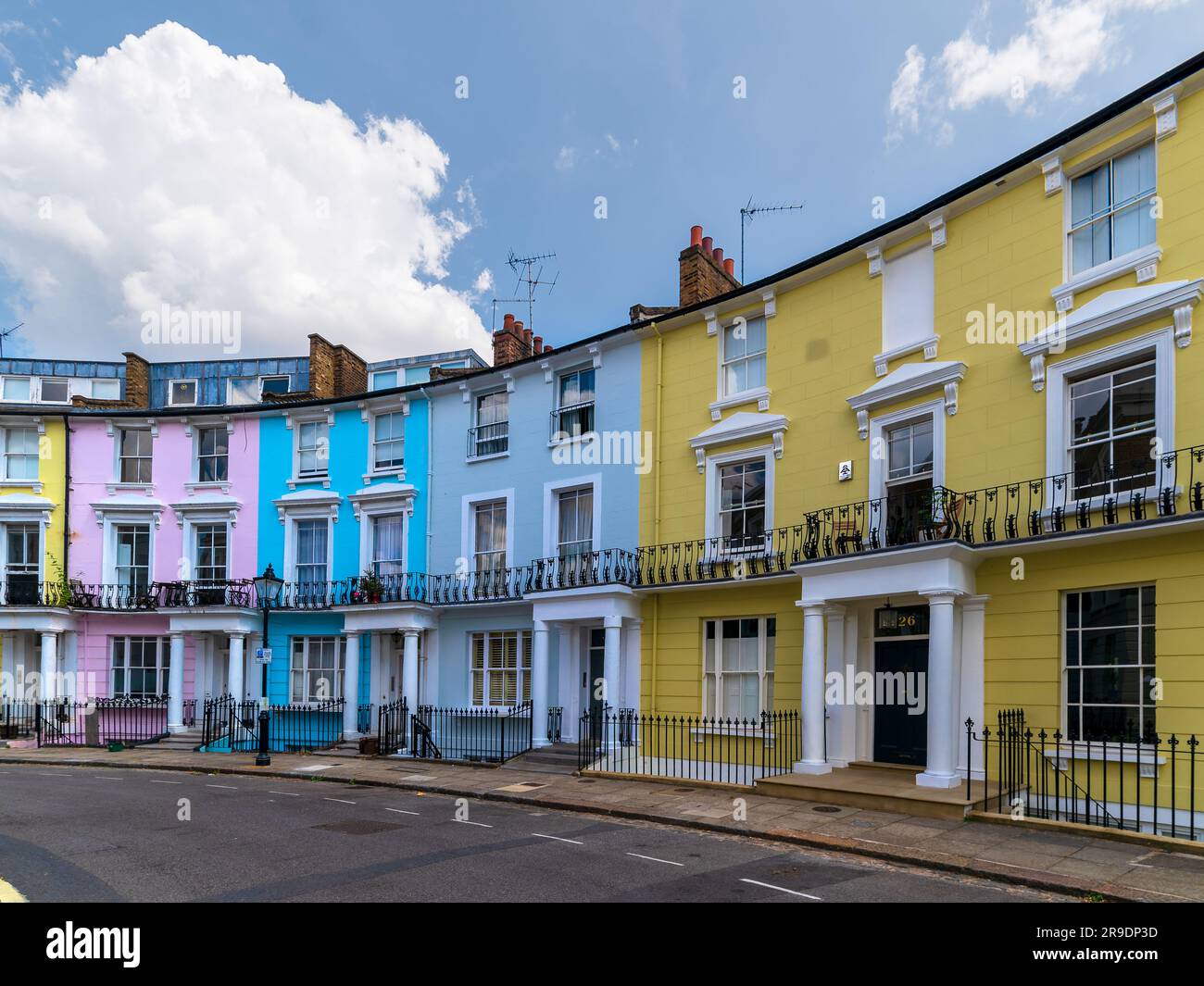 brightly-coloured houses in London Primrose hill. You can see these in ...