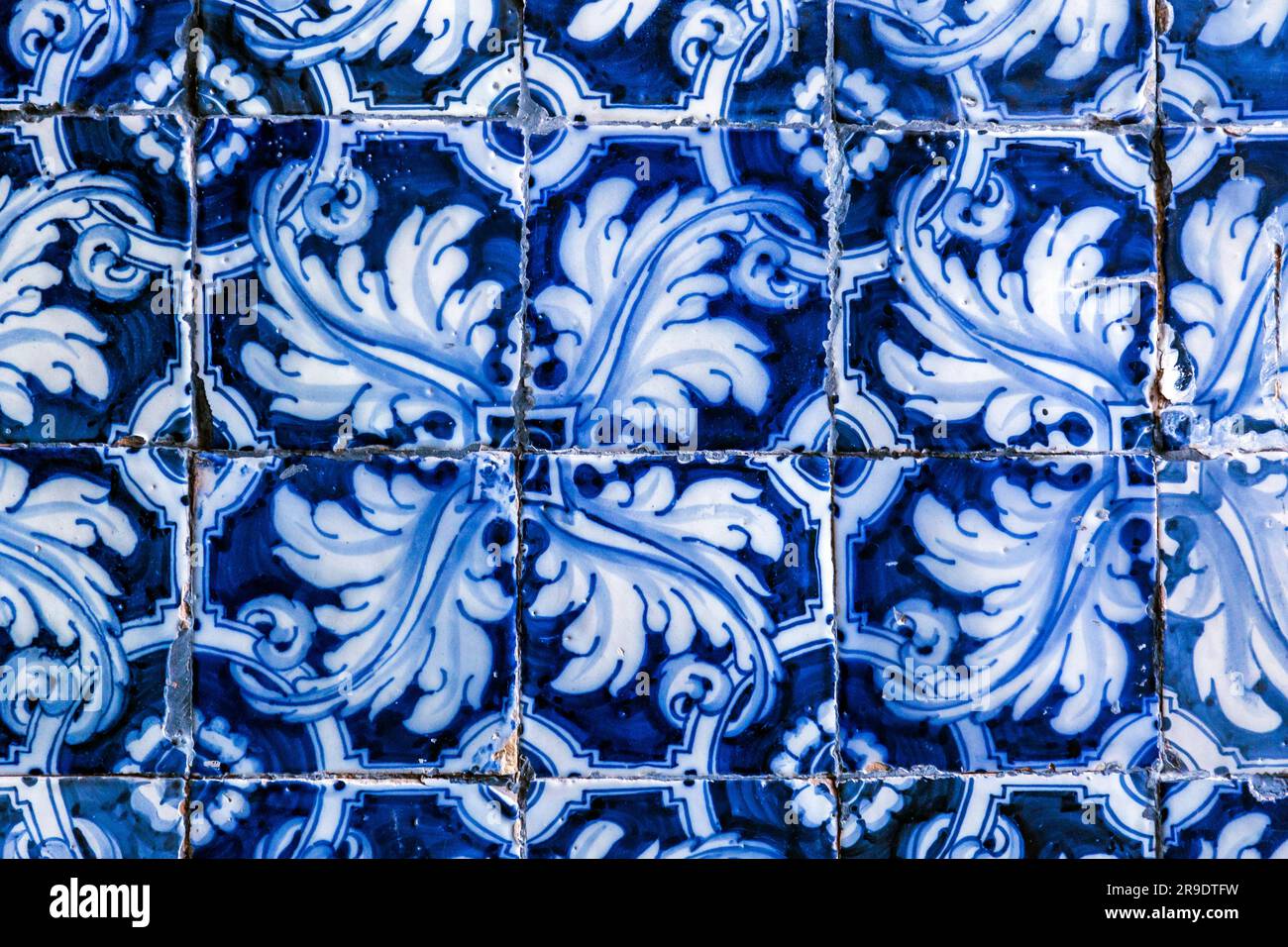 Fragment of Spanish glazed ceramic tiled wall close up texture ...