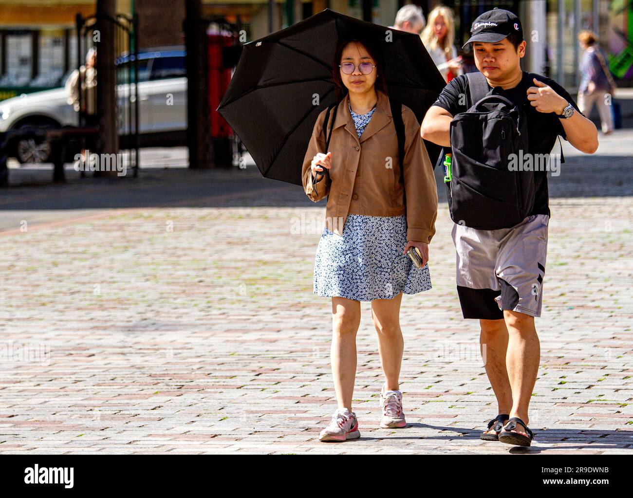 Woman out in breezy weather hi-res stock photography and images - Alamy