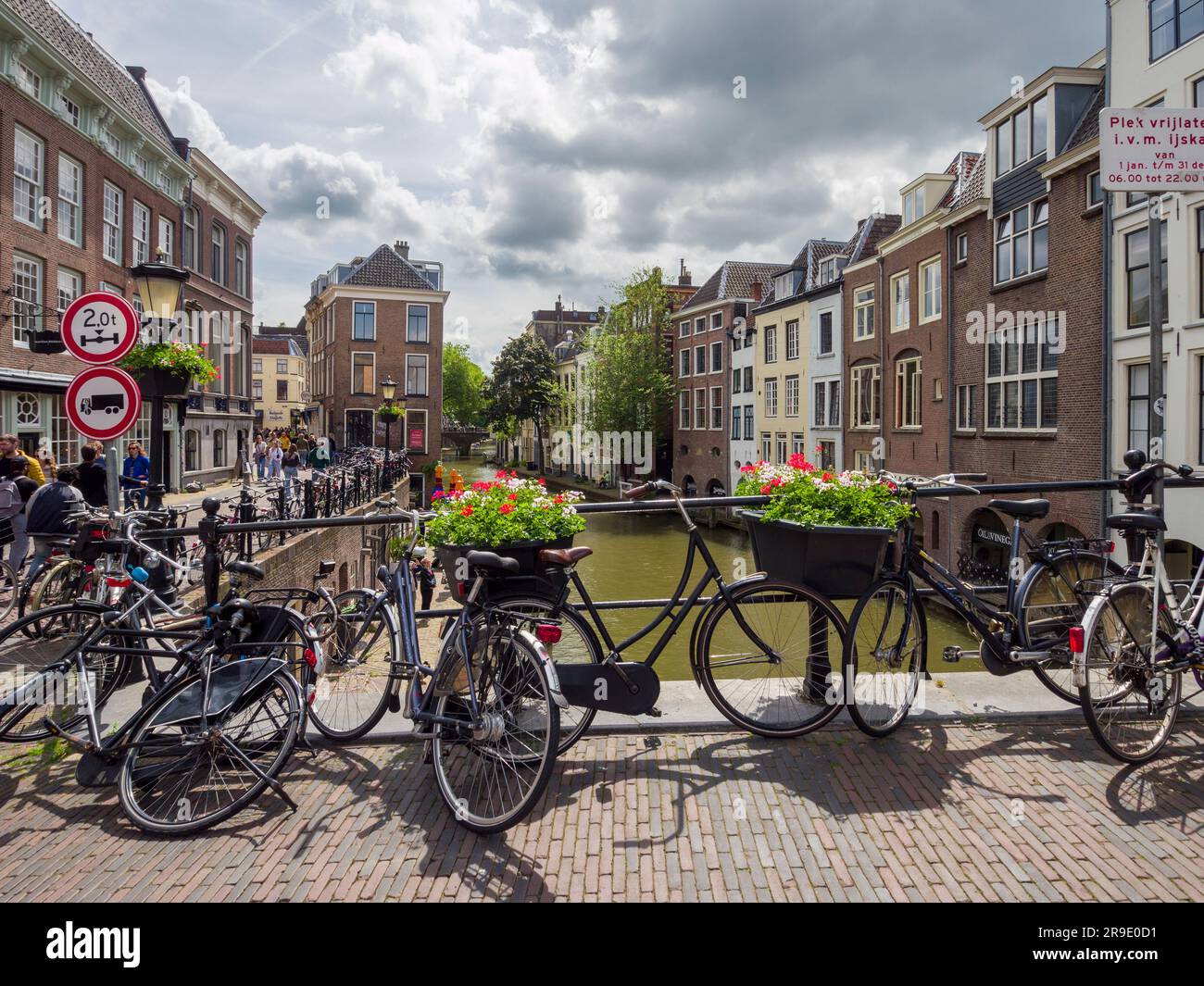 Bicycles on a bridge over the Oudegracht (Old Canal) through the ...