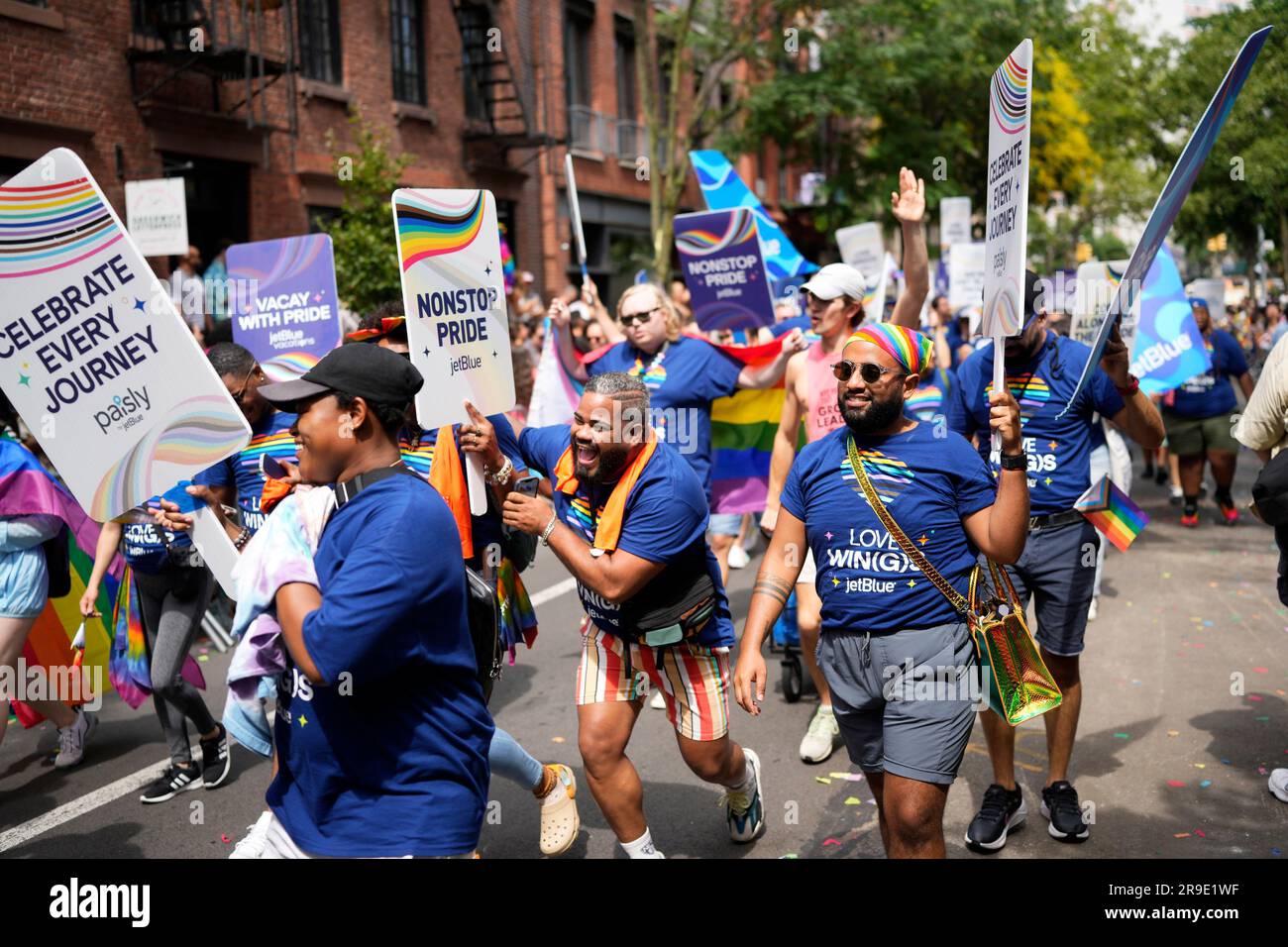 Participants from Jet Blue airlines walk in the NYC Pride March, Sunday ...