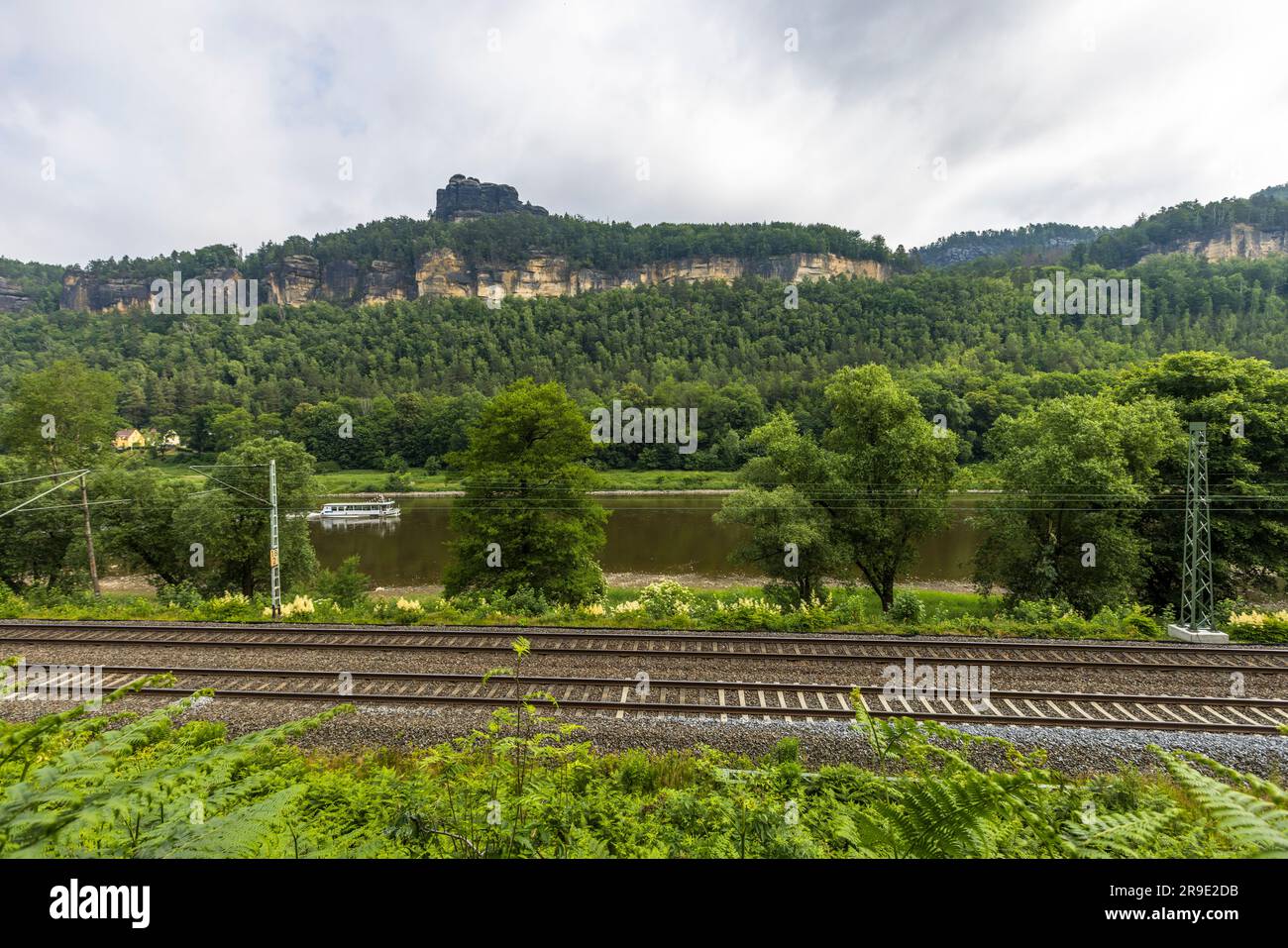 Railroad tracks along and shipping traffic on the Elbe with Elbe ...