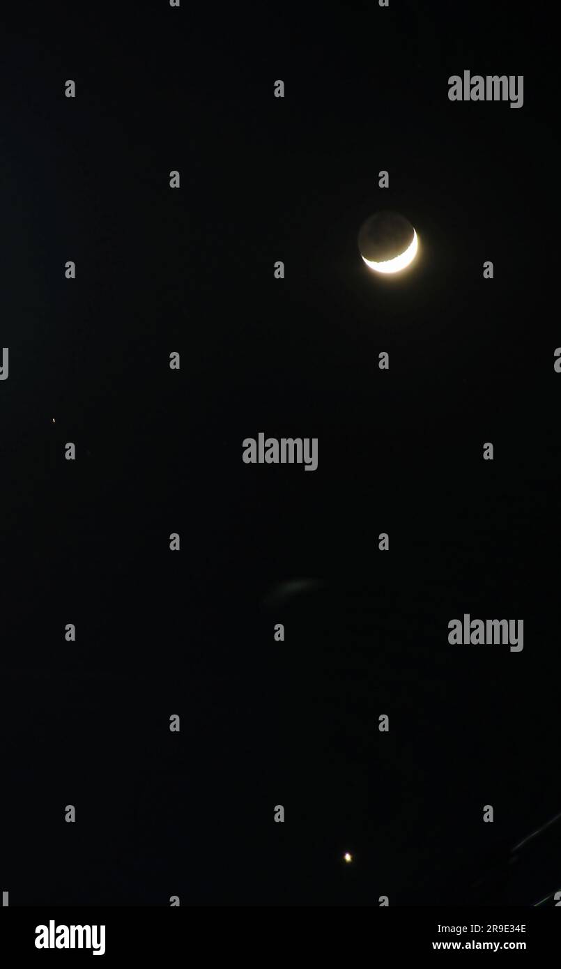 half moon and Venus arranging on sky in night Stock Photo - Alamy