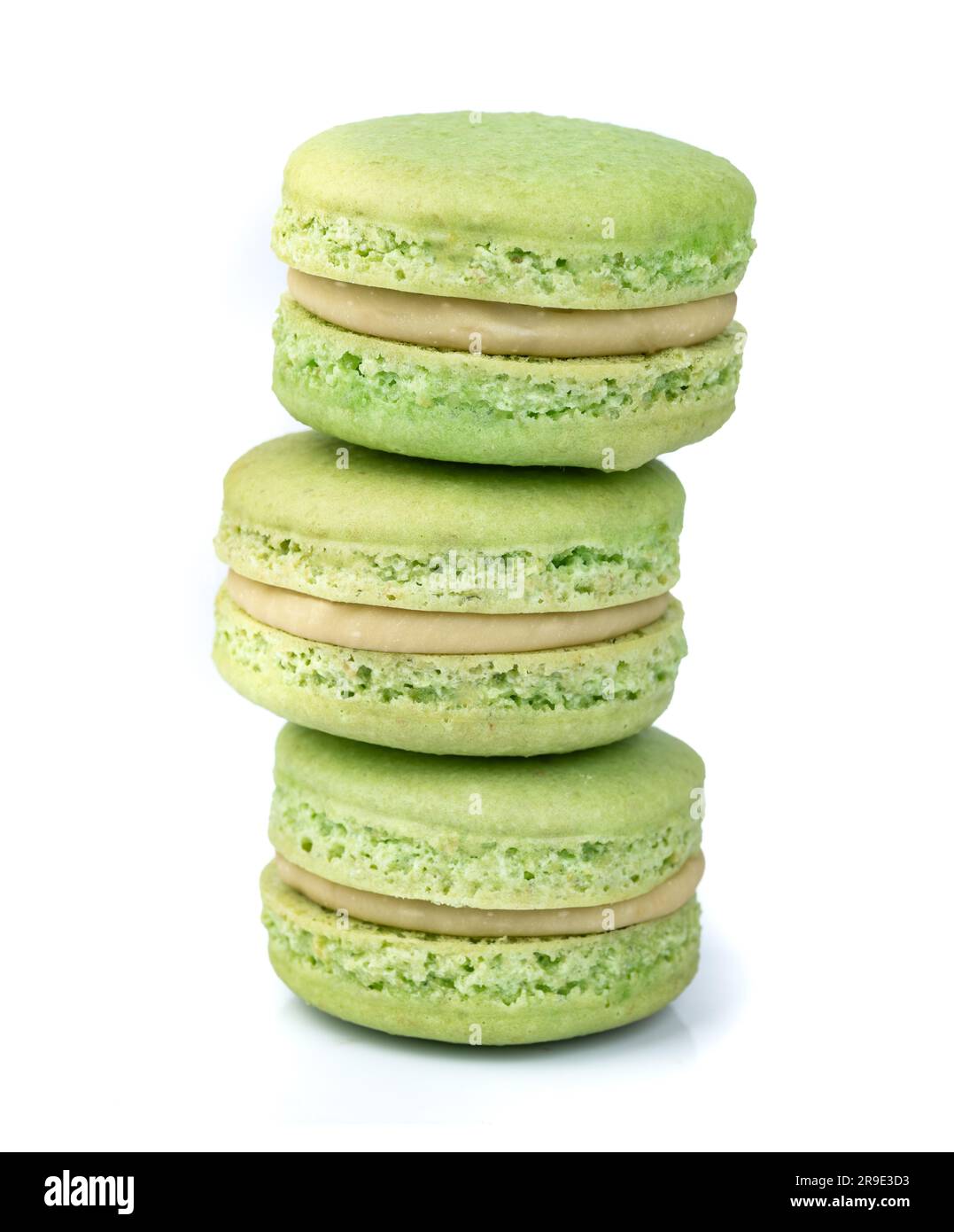 Pistachio macarons stacked isolated over white background Stock Photo ...