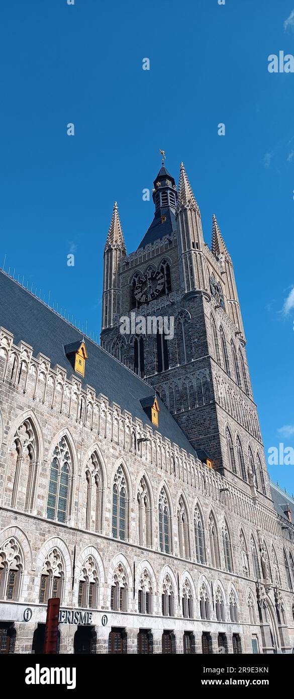 A beautiful shot of the historic old stone Museum Ypres, with its clock ...