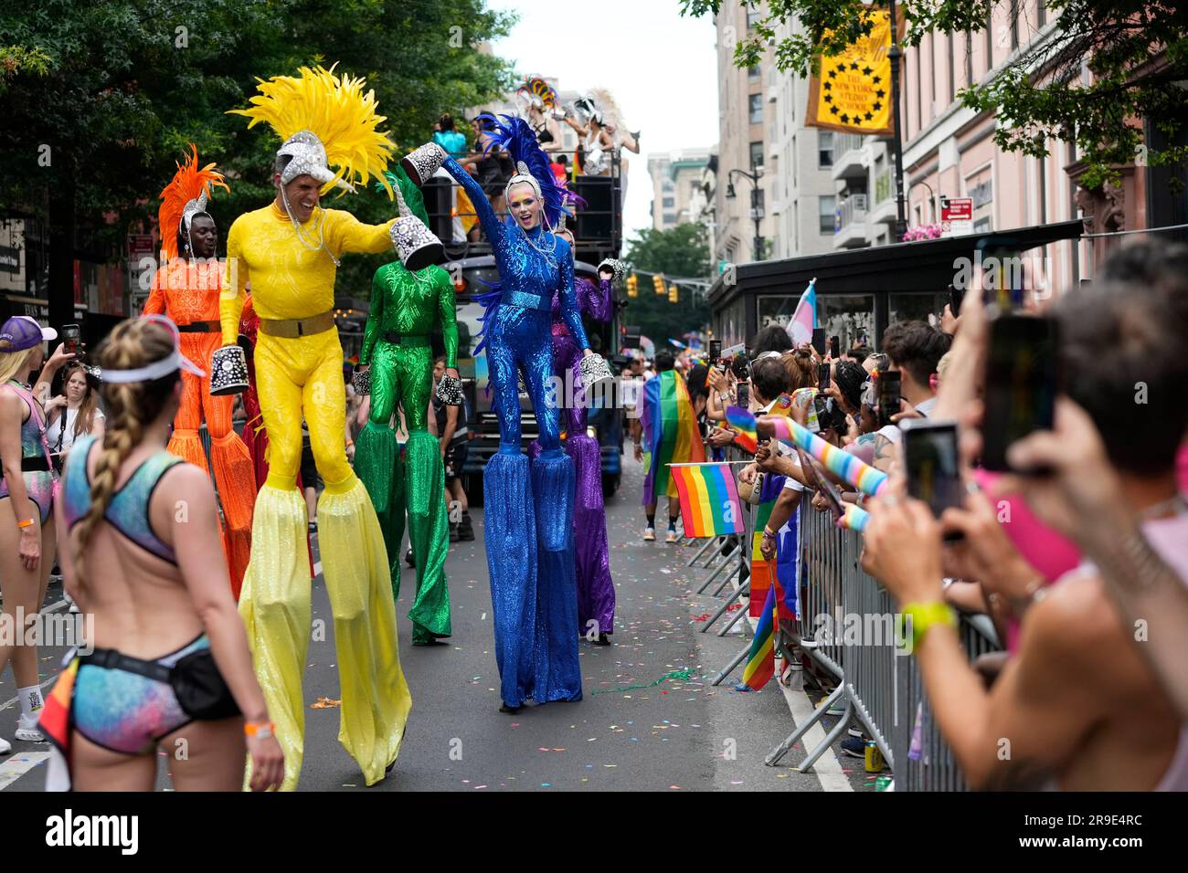 Participants from Junxion walk in the NYC Pride March, Sunday, June 25, 2023, in New York ...