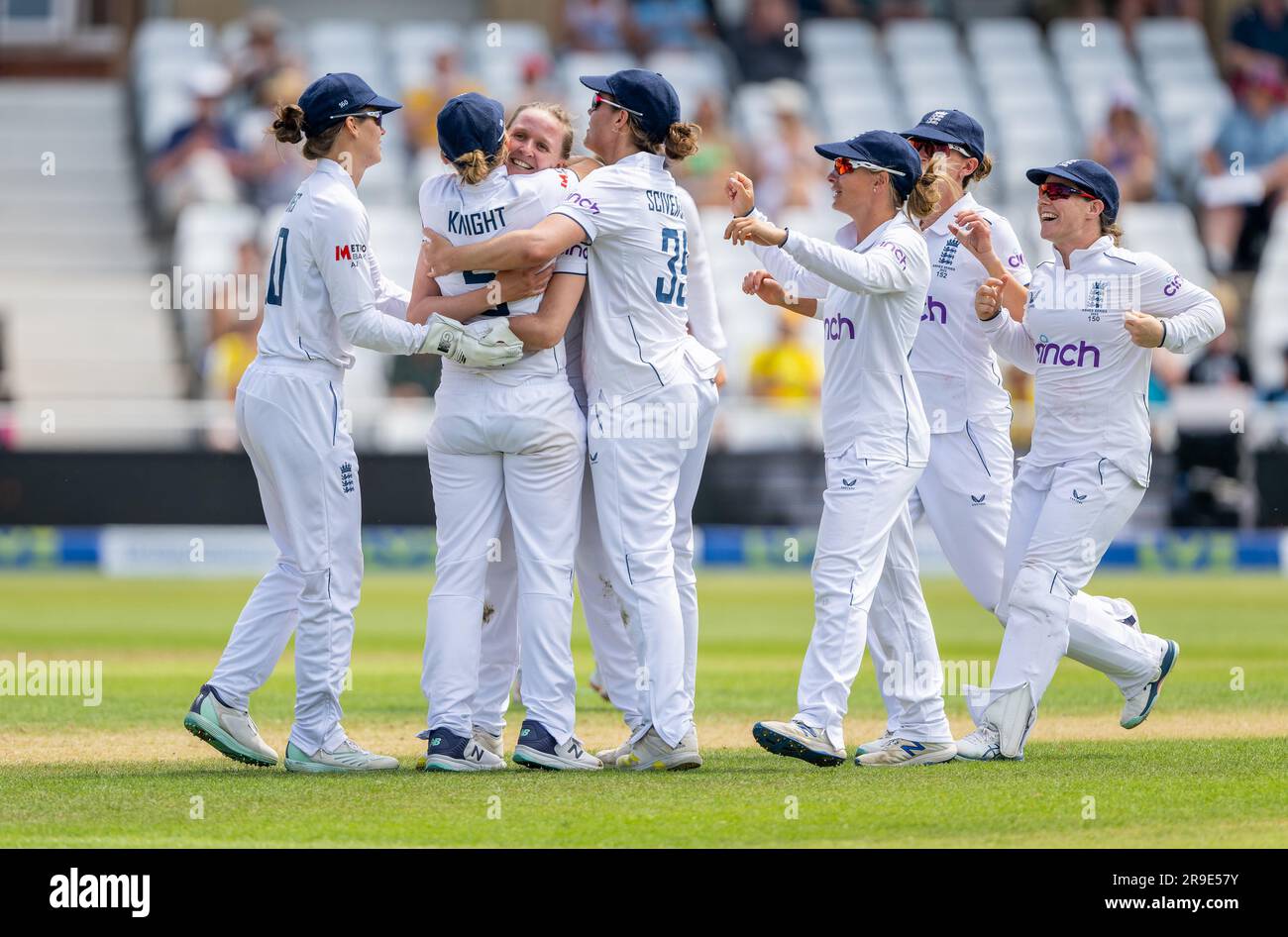 England’s Lauren Filer (3rd left) is congratulated by England players ...