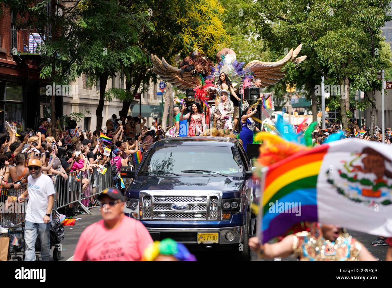 A float celebrating Mexican culture rides in the NYC Pride March ...
