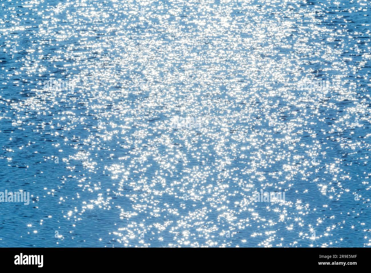 abstract natural background: view on sunshine in a blue water Stock ...