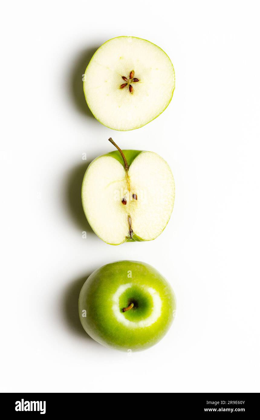 Three views of a green apple on white background Stock Photo - Alamy