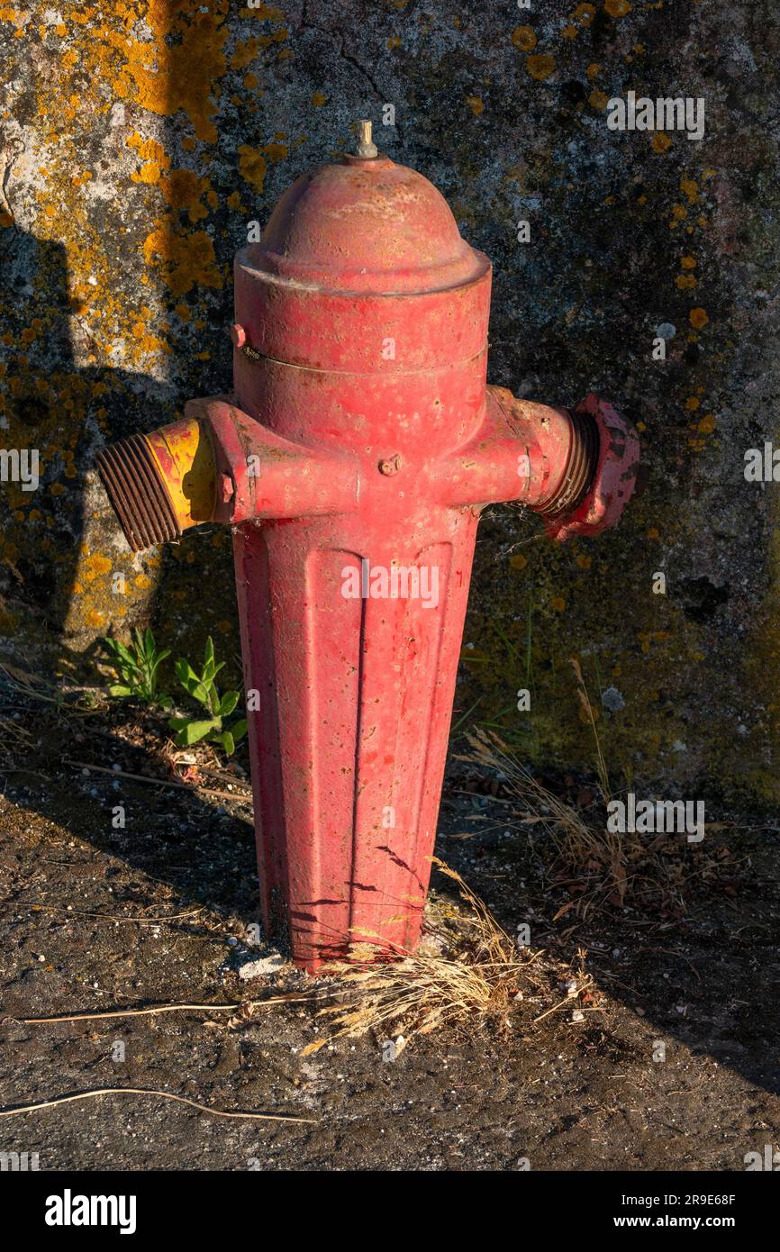 Red painted fire hydrant, Kefalonia,Greece Stock Photo - Alamy