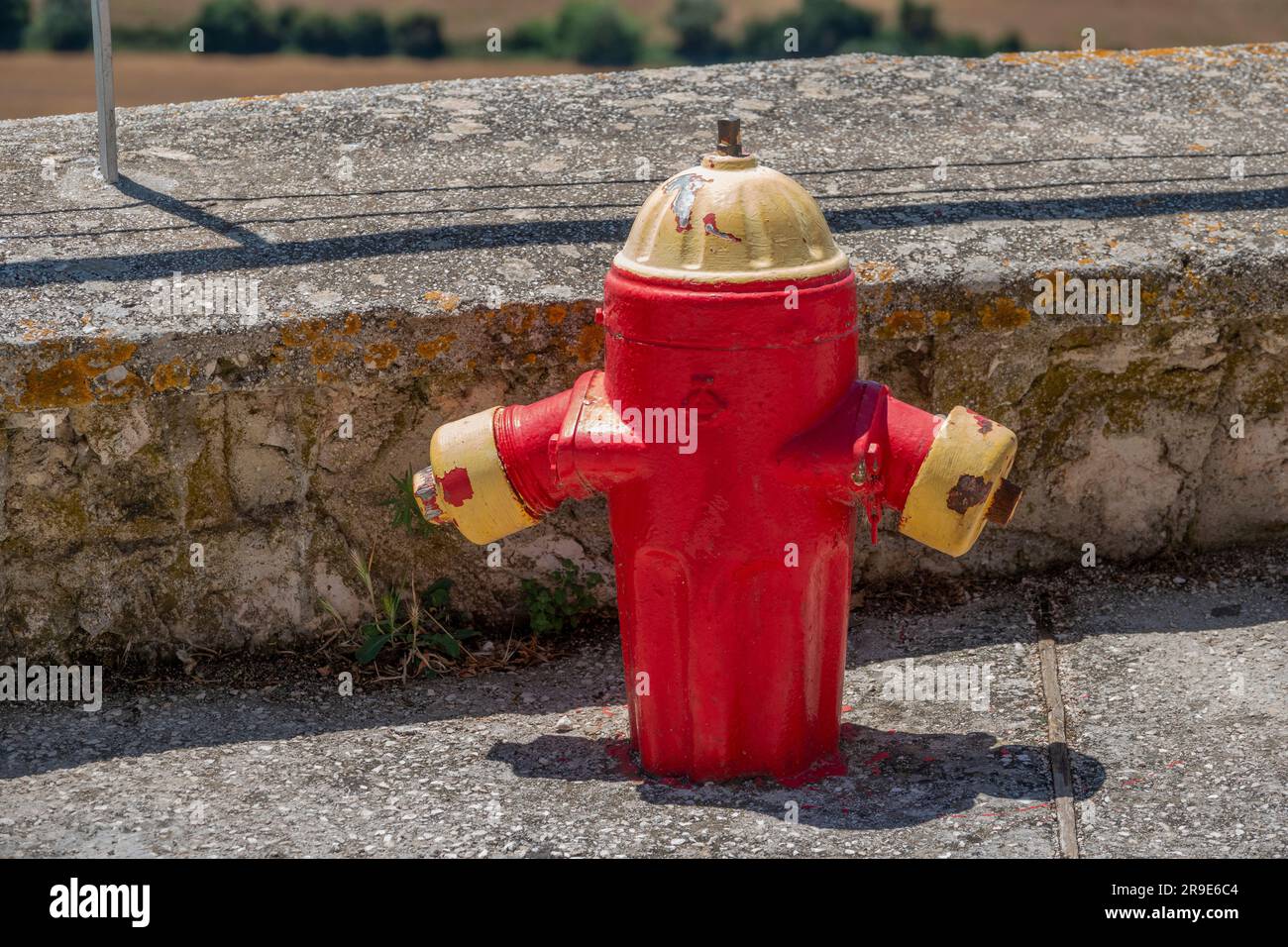 Red painted, short fire hydrant, Kefalonia,Greece Stock Photo - Alamy