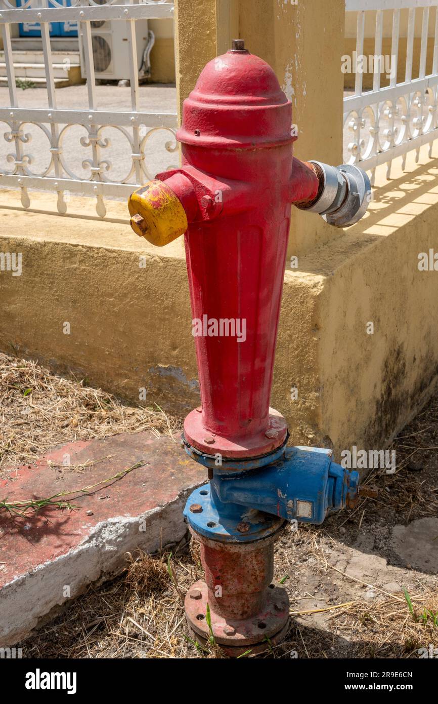 Red painted fire hydrant, Kefalonia,Greece Stock Photo - Alamy