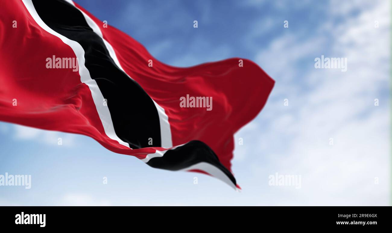 Detail of Trinidad and Tobago national flag waving. The Republic of Trinidad and Tobago is an ...