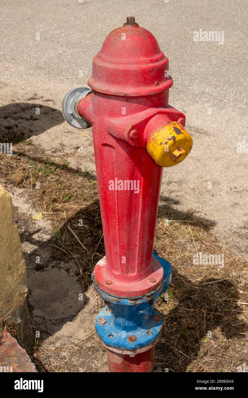 Red painted fire hydrant, Kefalonia,Greece Stock Photo - Alamy