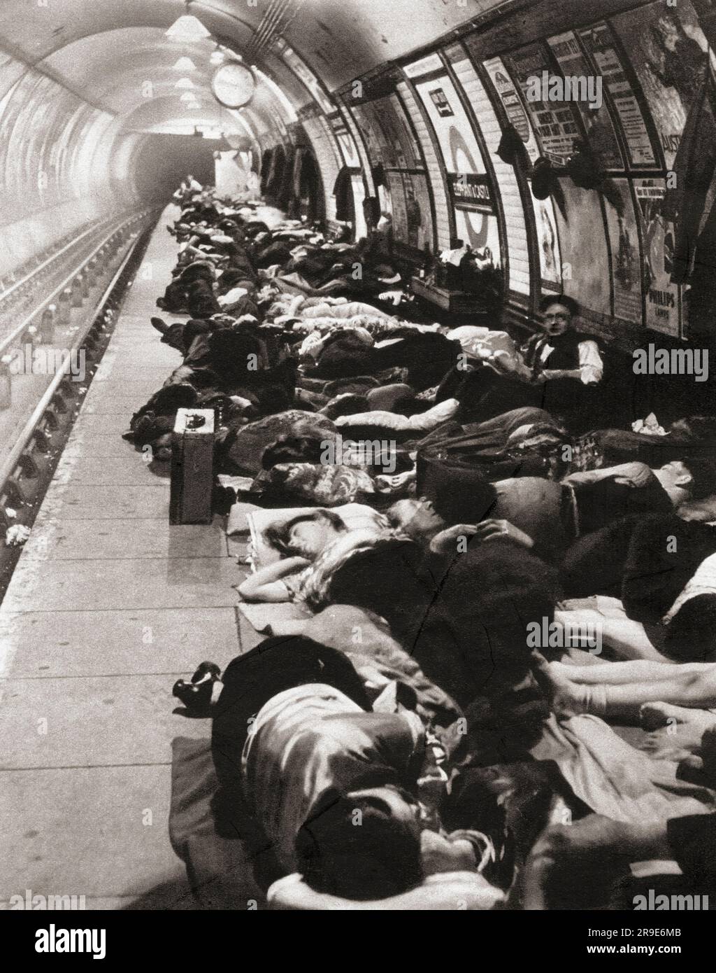 Civilains sheltering in the tube station from the bombs during WWII ...