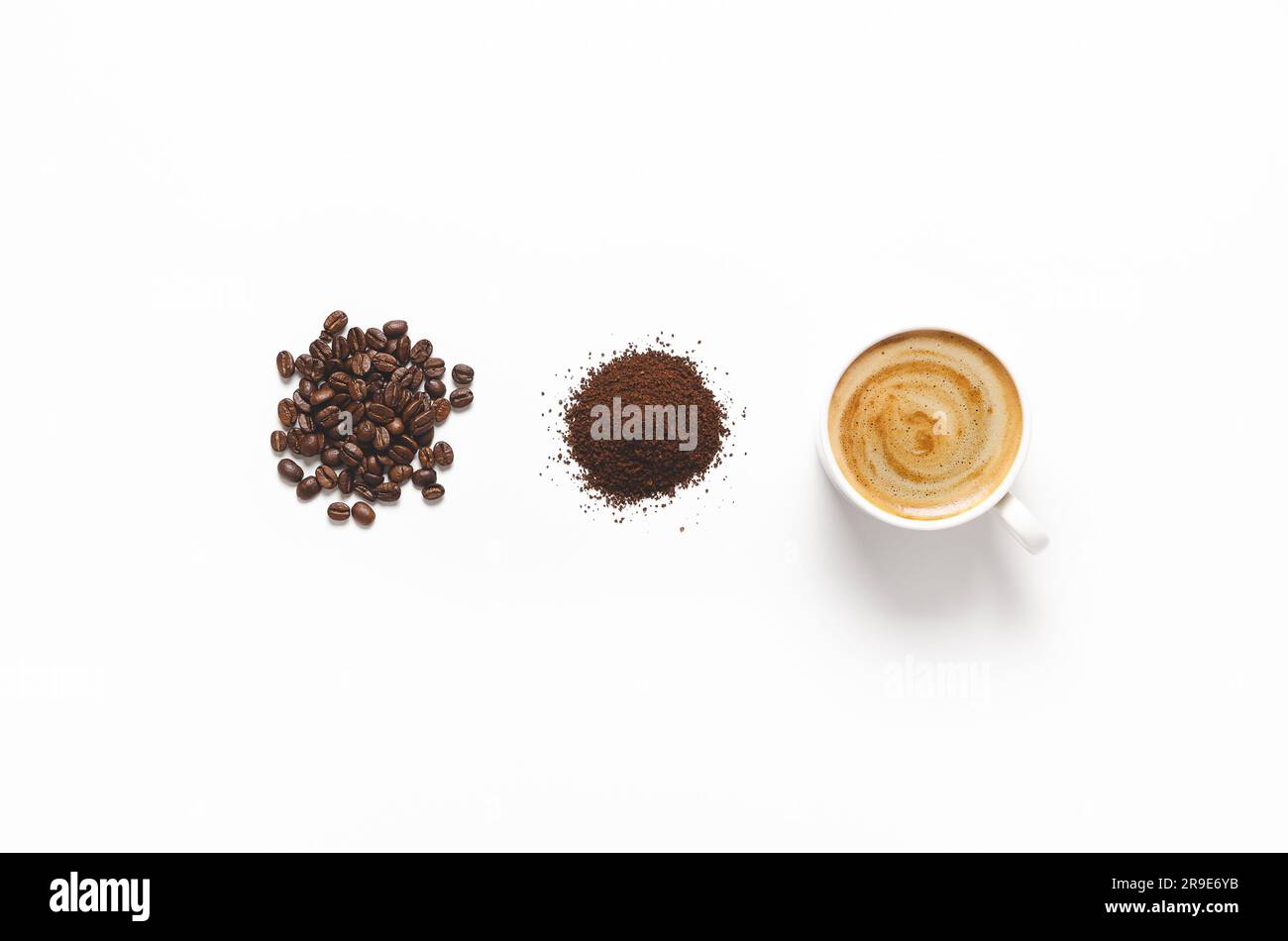 Coffee beans, grounded coffee, and a cup of coffee on white background ...