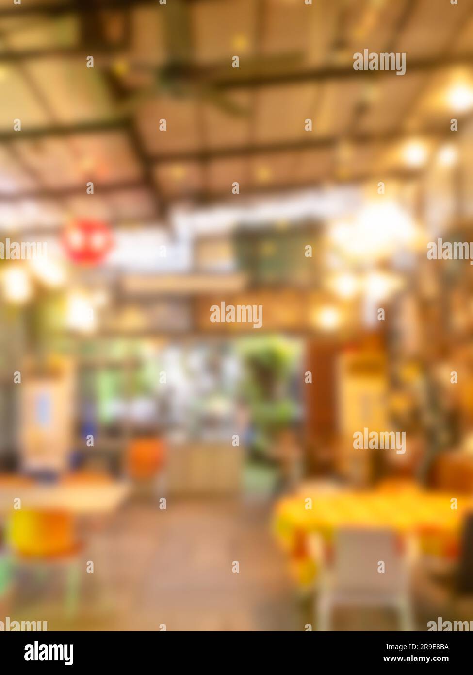 Blurred photo of interior restaurant view background with dining table ...