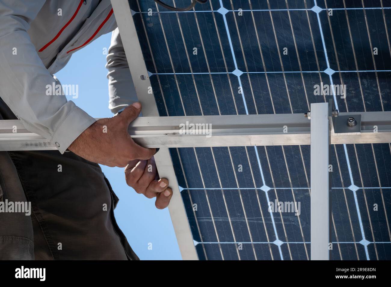 Rooftop solar panel installation hi-res stock photography and images ...