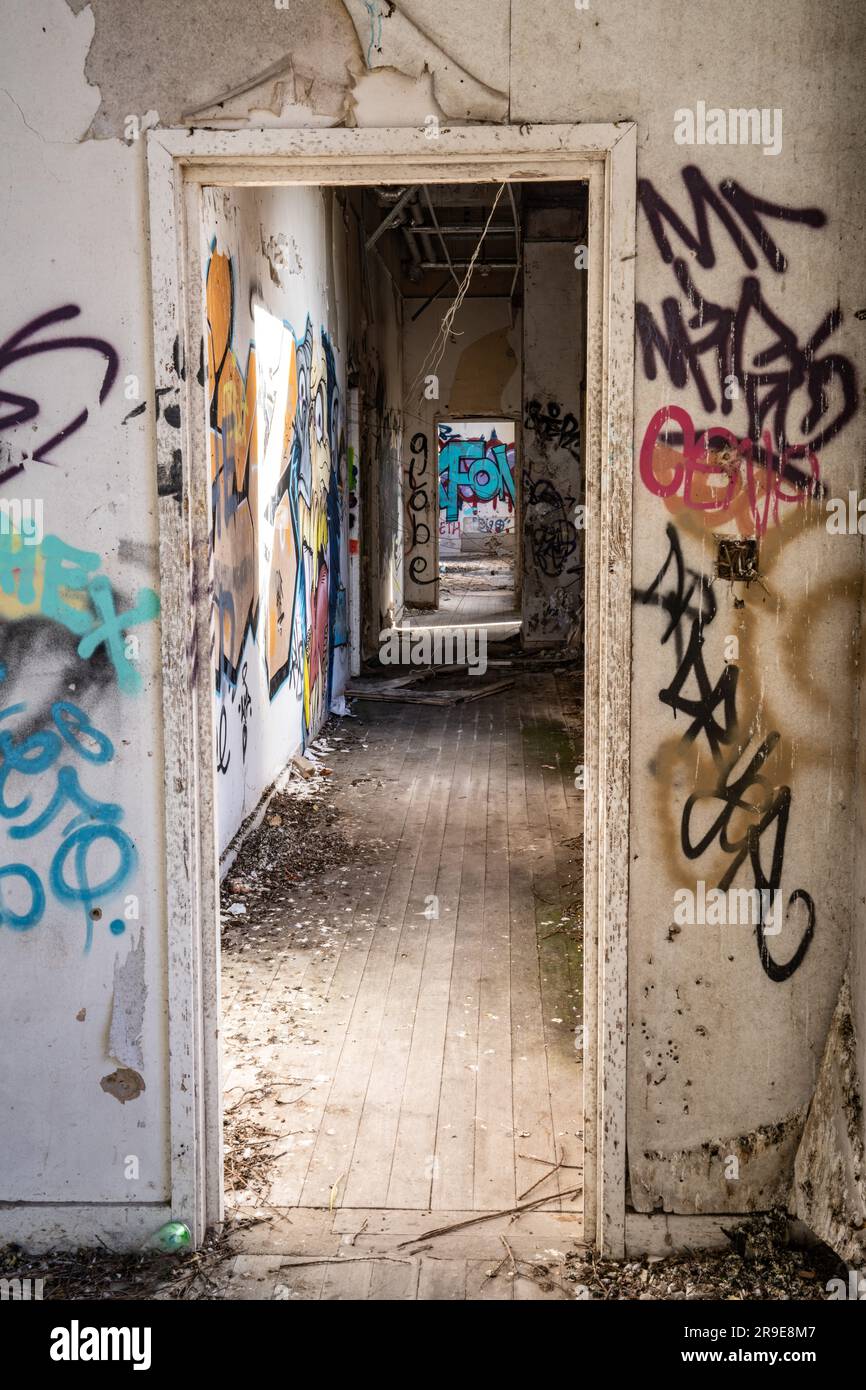 Graffiti on walls of corridor in an abandoned airbase Stock Photo - Alamy