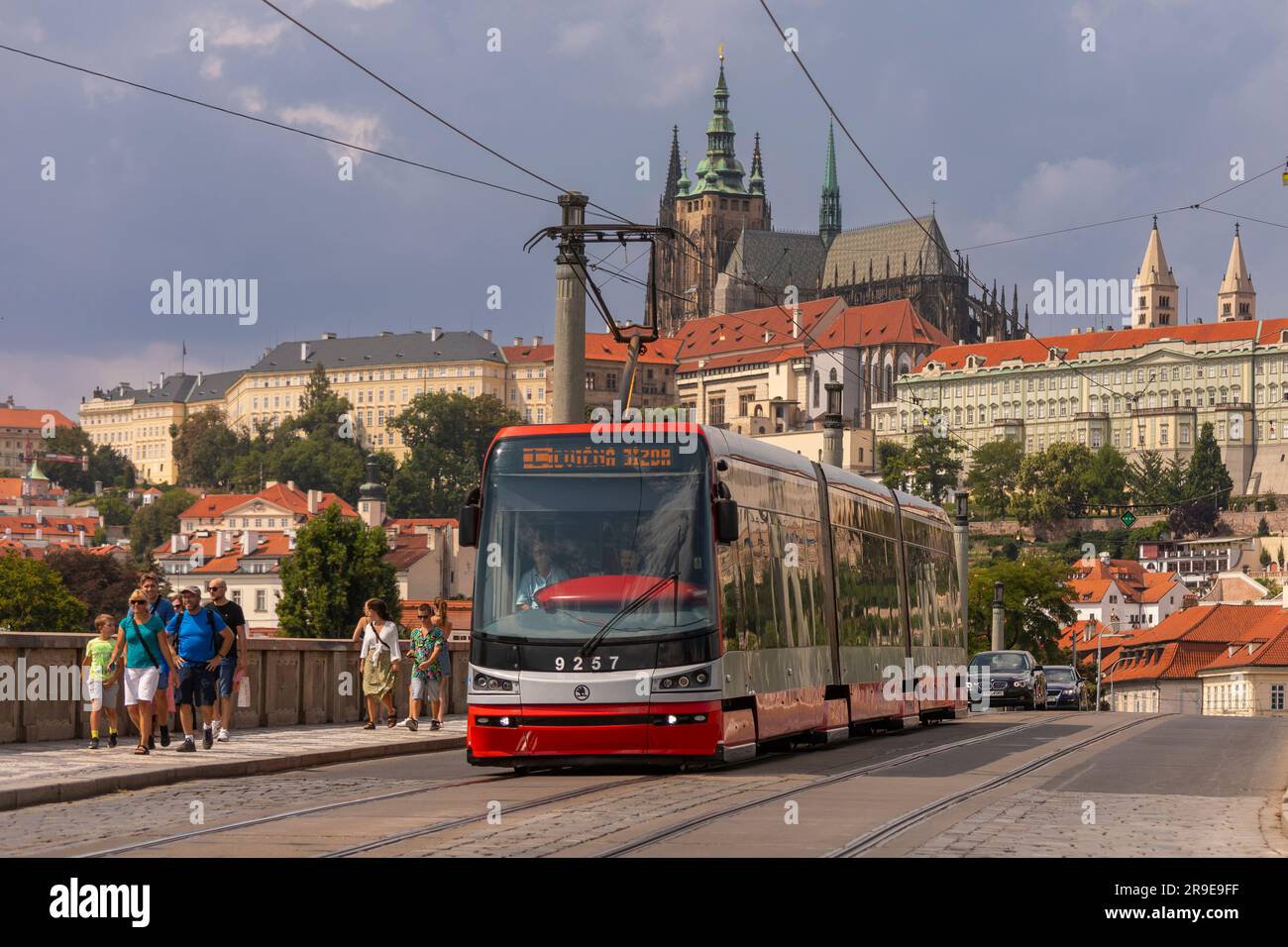 PRAGUE, CZECH REPUBLIC, EUROPE - Tram crosses Manes Bridge. At rear is ...