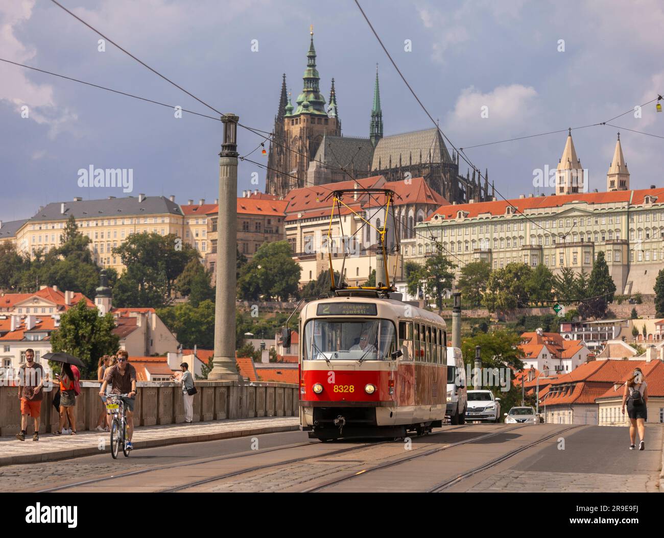 PRAGUE, CZECH REPUBLIC, EUROPE - Tram crosses Manes Bridge. At rear is ...