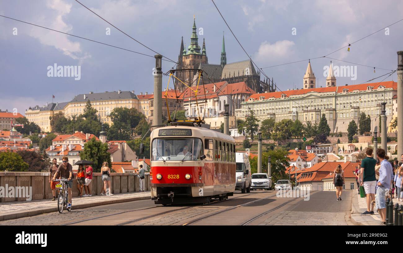 PRAGUE, CZECH REPUBLIC, EUROPE - Tram crosses Manes Bridge. At rear is ...
