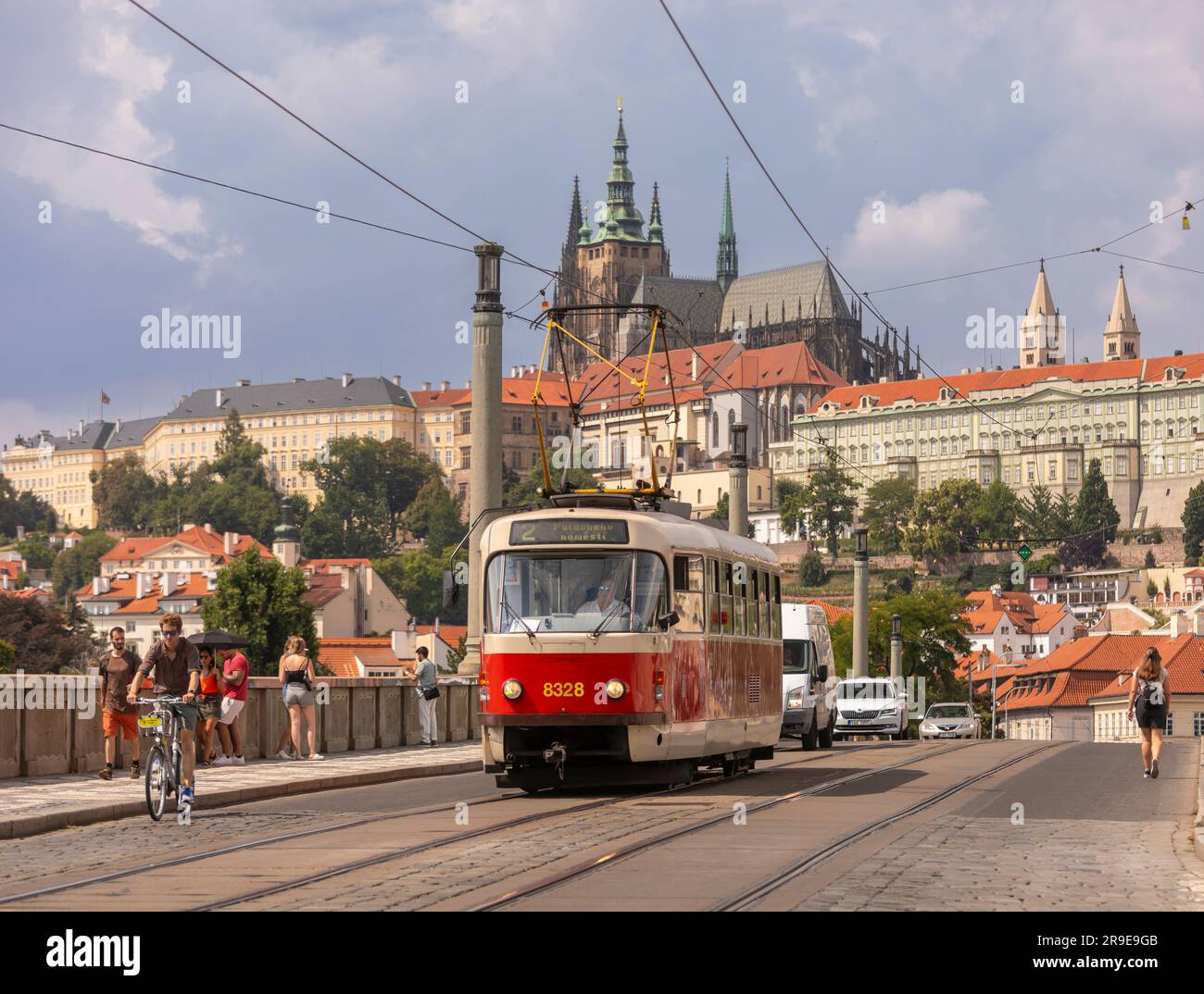 PRAGUE, CZECH REPUBLIC, EUROPE - Tram crosses Manes Bridge. At rear is ...