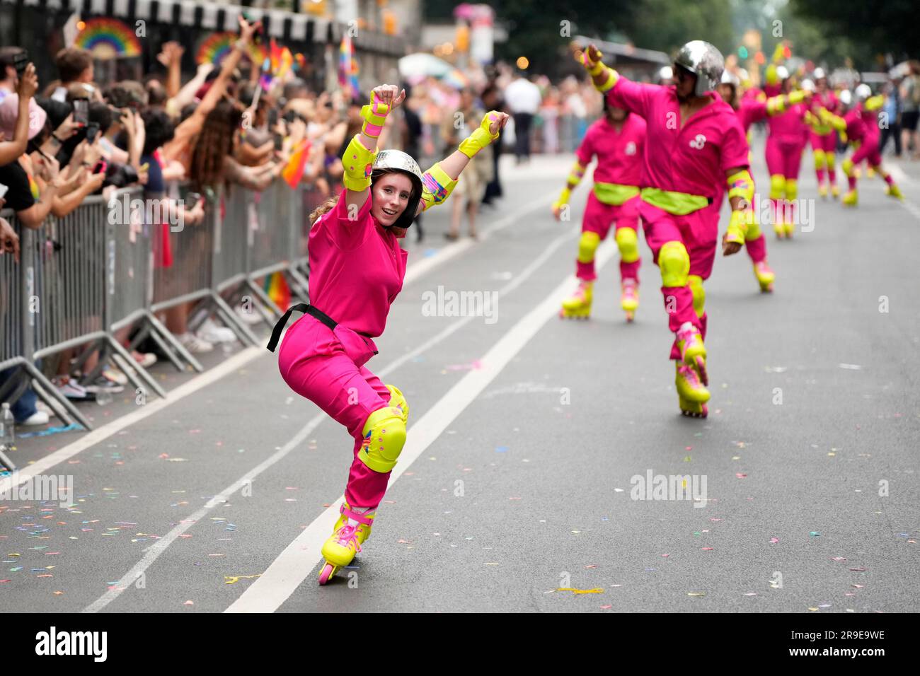 Paradegoers promoting the upcoming "Barbie," movie skate in the NYC ...