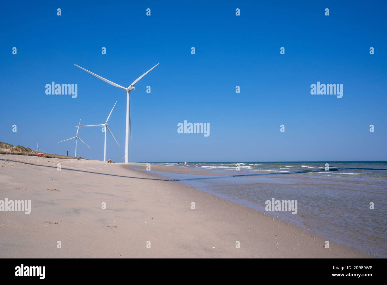 Wind turbines on the beach Stock Photo - Alamy