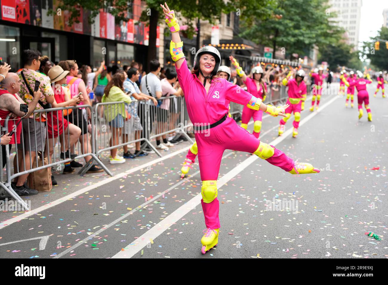 Paradegoers promoting the upcoming "Barbie," movie skate in the NYC ...