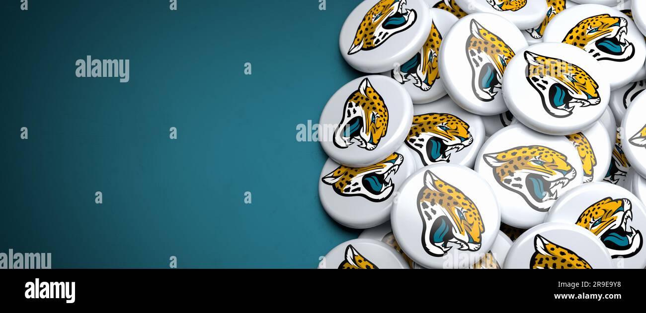 Logos of the American Football Team Jacksonville Jaguars on a heap on a ...