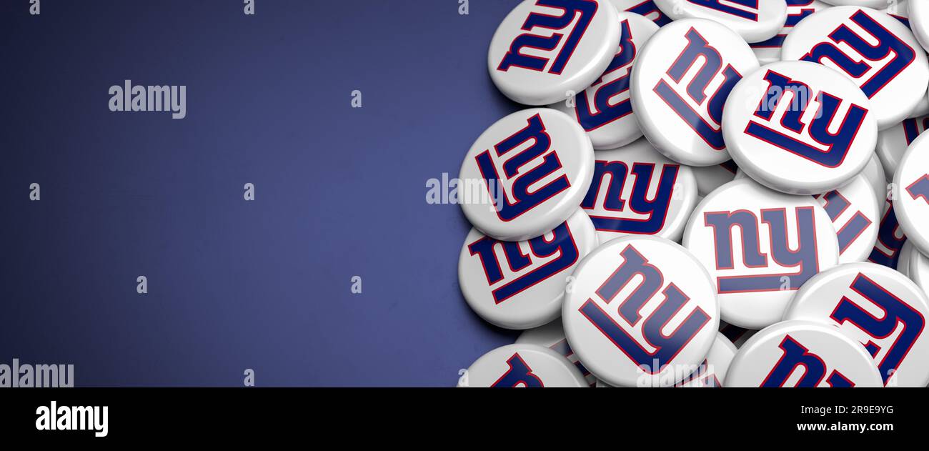 Logos of the American Football Team New York Giants on a heap on a ...