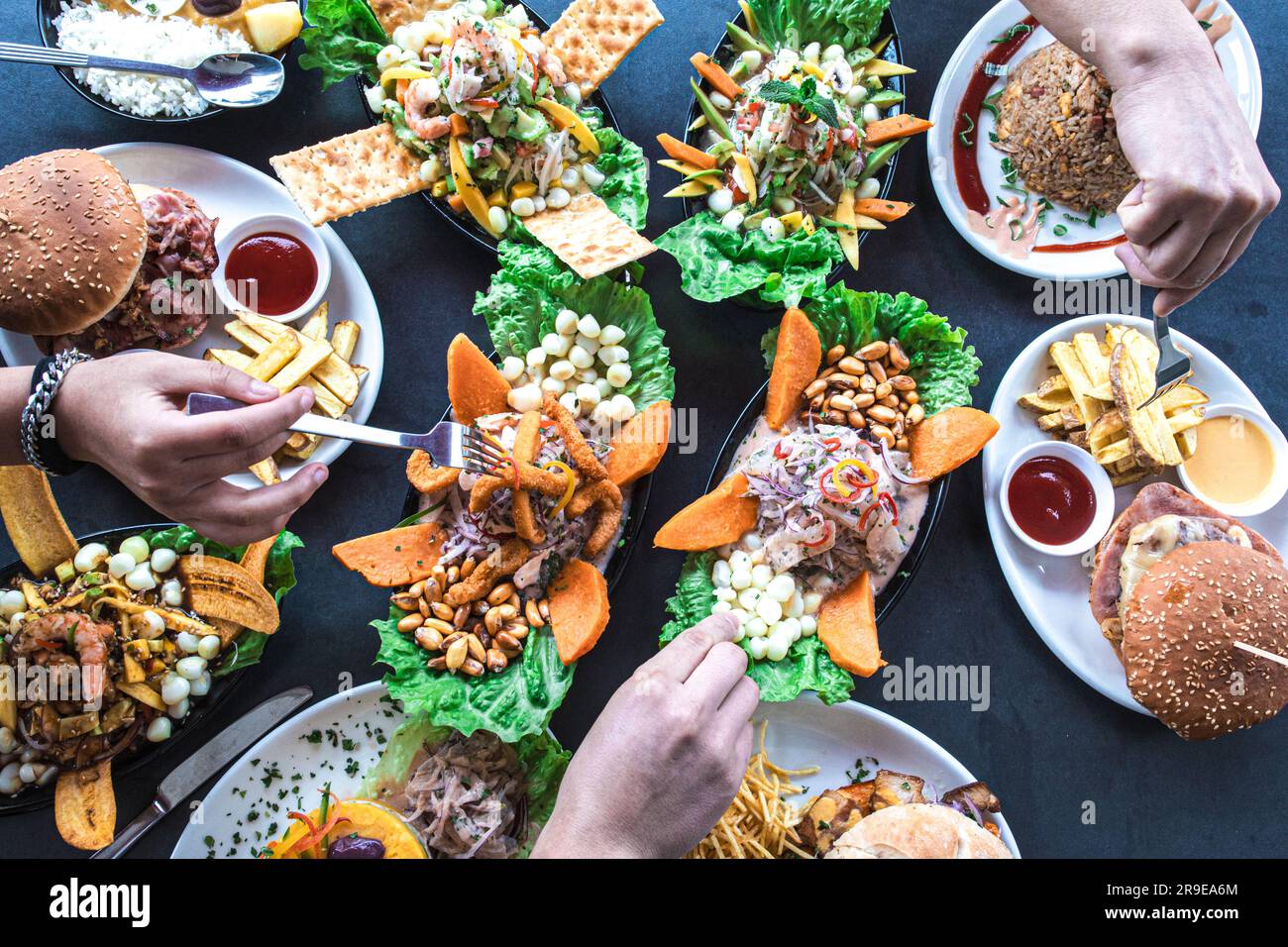View from above of a group of people eating in a restaurant of Peruvian ...