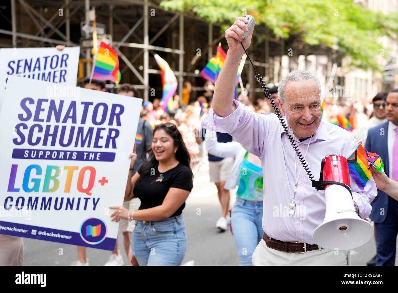 New York Sen. Chuck Schumer walks in the NYC Pride March on Sunday ...
