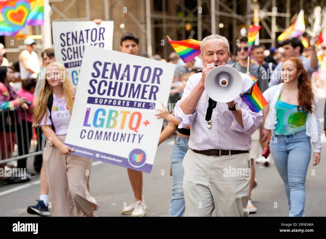New York Sen. Chuck Schumer walks in the NYC Pride March on Sunday ...