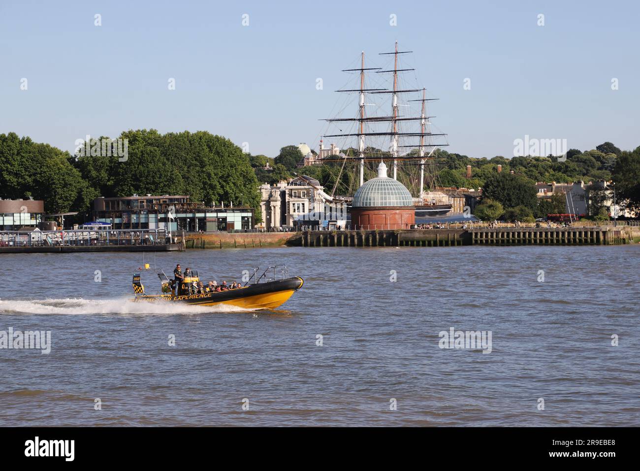 Sightseeing rib boat on River Thames with Cutty Sark Greenwich London ...