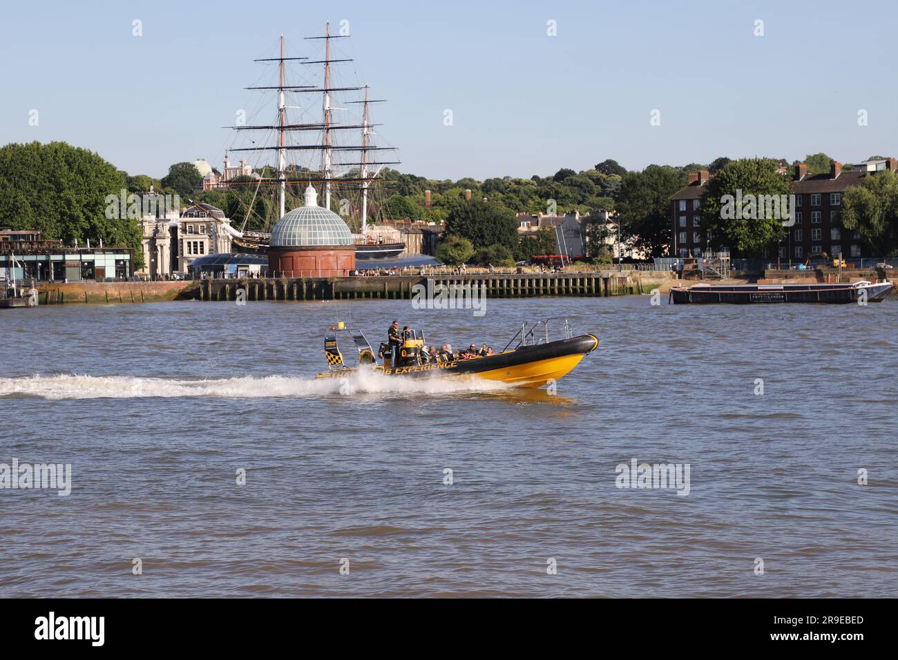 Sightseeing rib boat on River Thames with Cutty Sark Greenwich London ...