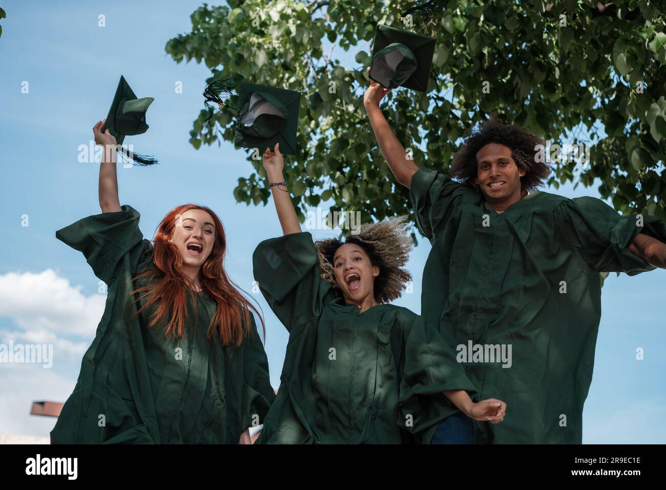 Graduates jumping hi-res stock photography and images - Alamy