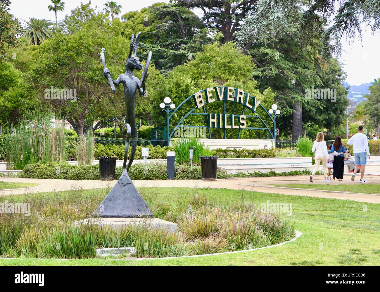 The Drummer bronze sculpture by Barry Flanagan and Beverly Hills sign ...