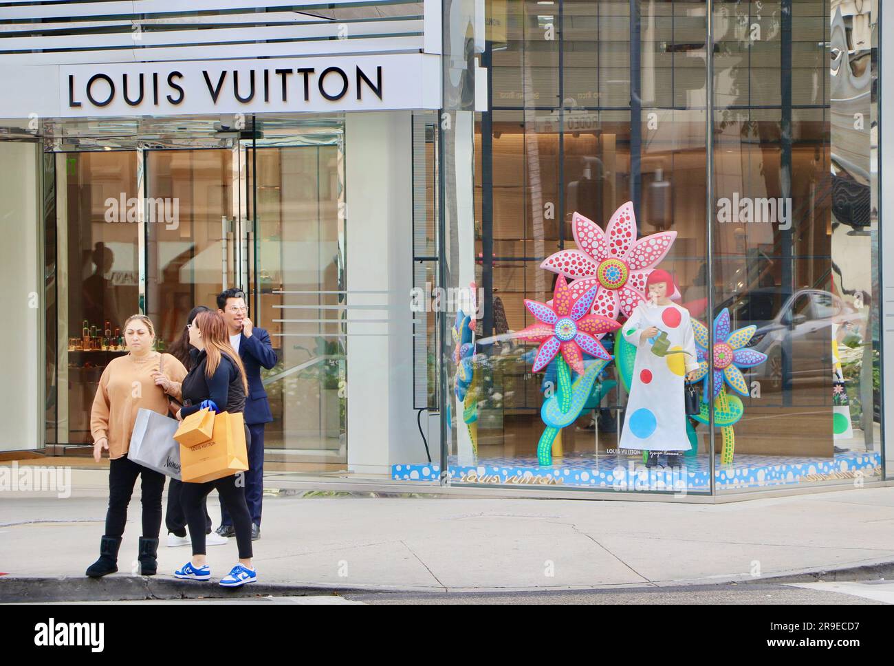 French luxury fashion house Louis Vuitton shop front window display ...