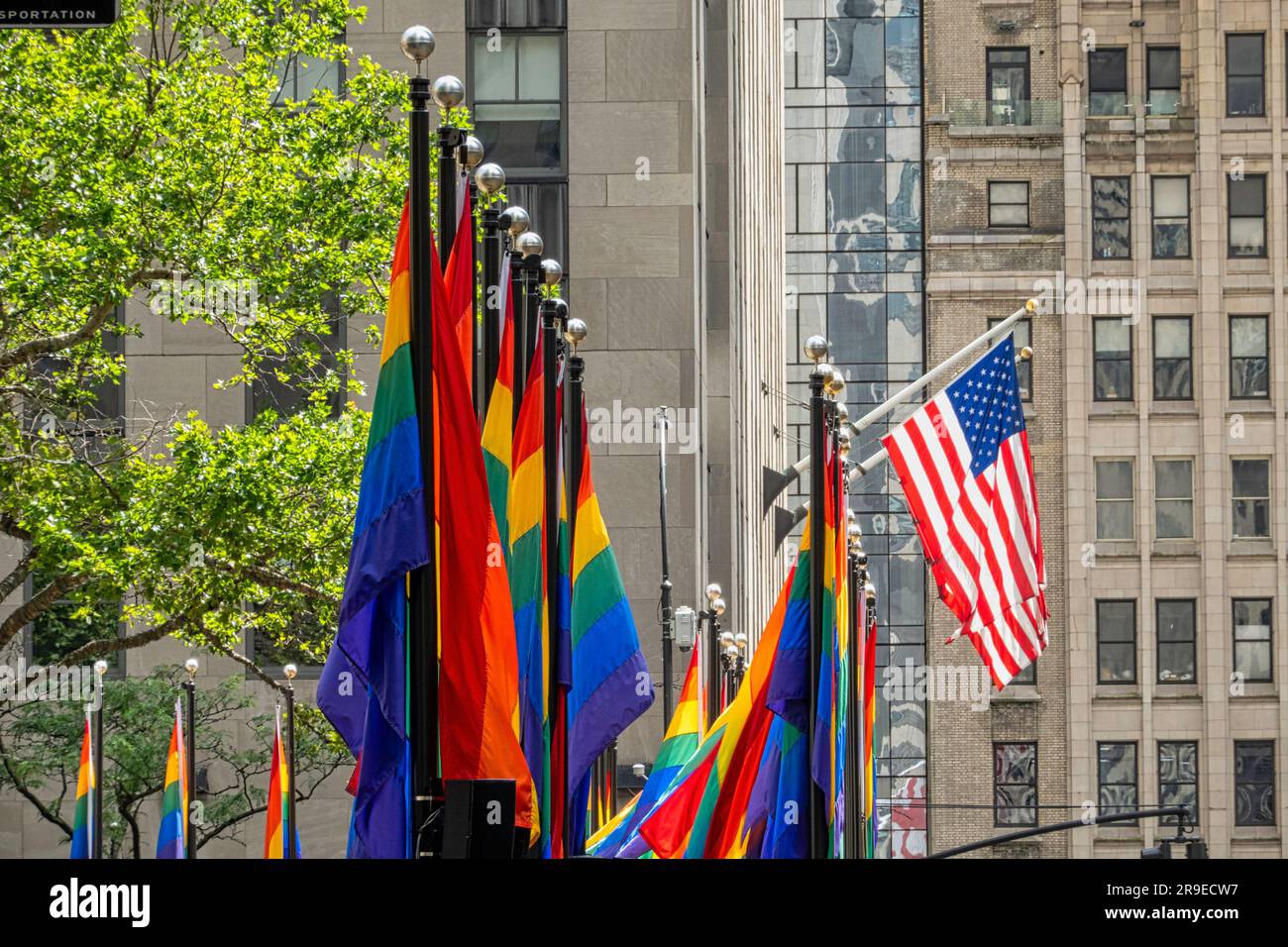 Pride month flags surround the plaza in Rockefeller Center, New York ...