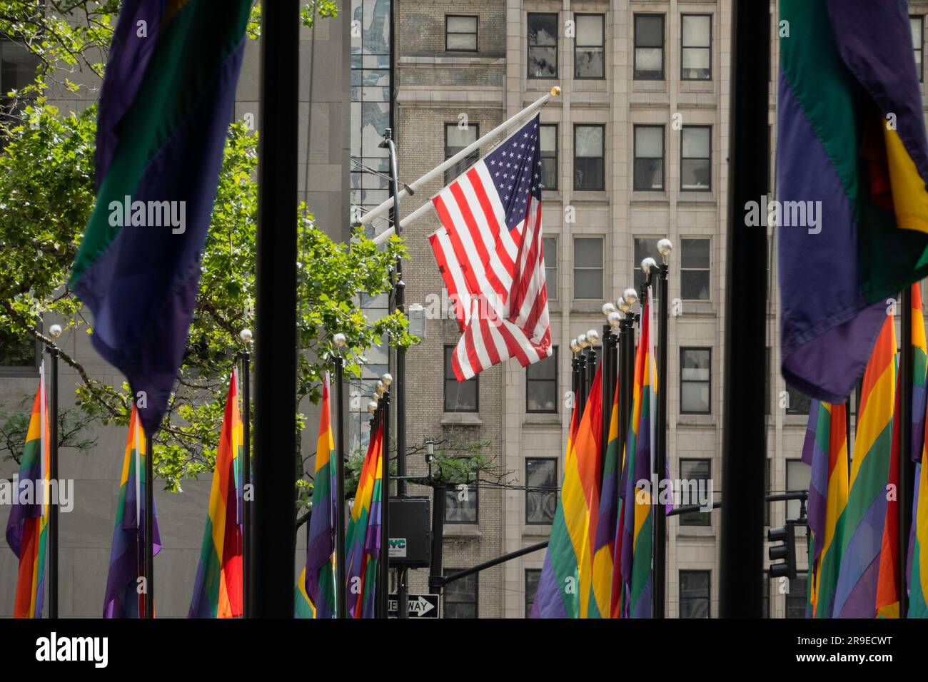 Pride month flags surround the plaza in Rockefeller Center, New York ...