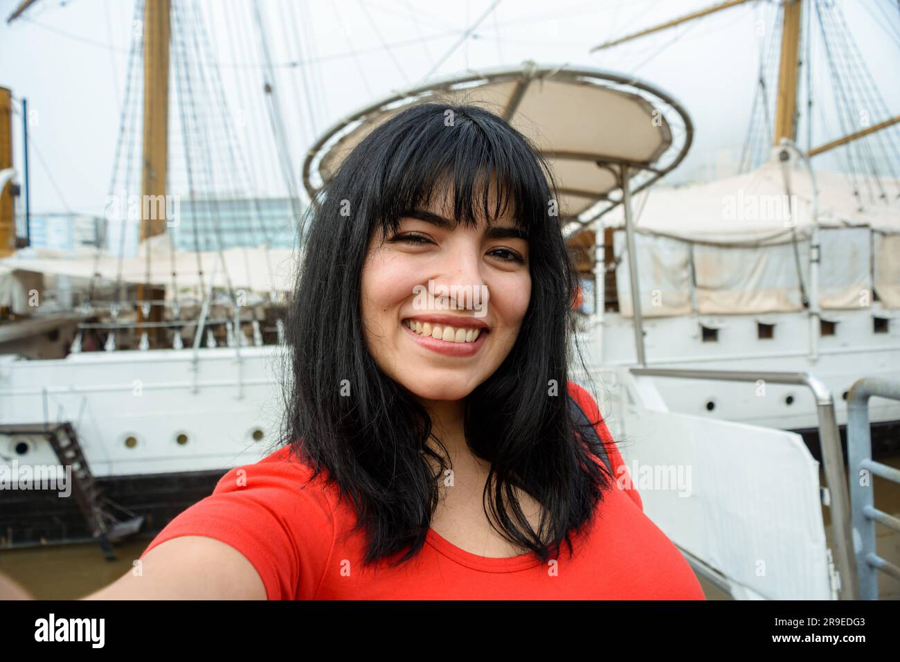 selfie photo of young latin woman of venezuelan ethnicity, standing ...
